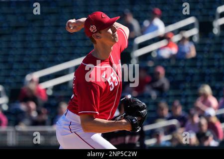 Cincinnati Reds pitcher Brandon Williamson tosses the baseball after ...