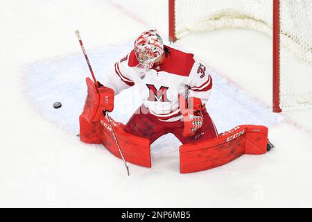 December 10, 2020 The puck is shot wide of North Dakota Fighting Hawks ...