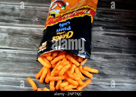 Cairo, Egypt, February 10 2023: Cheetos puffs with enriched corn meal ...