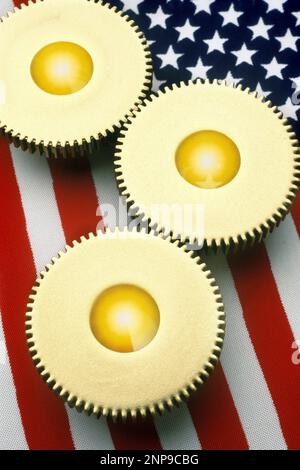 INTERLOCKING GOLDEN COG GEAR WHEELS FLAG OF SPAIN Stock Photo - Alamy