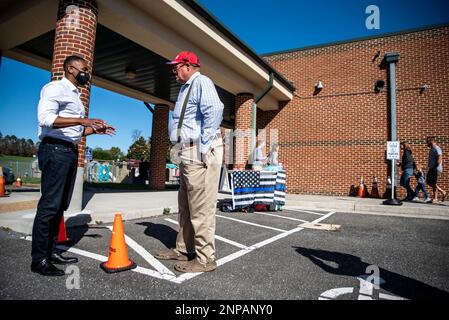 Dr. Cameron Webb speaks with delegate Matt Fariss at Rustburg ...