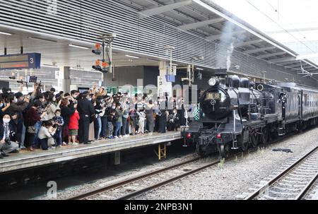 A steam locomotive (SL) train " Kimetsu no Yaiba" train is running in ...