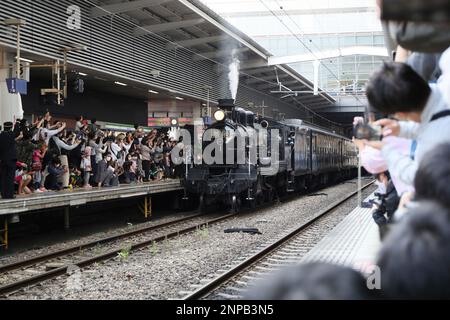 A steam locomotive (SL) train " Kimetsu no Yaiba" train is running in ...