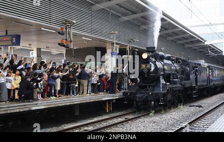 A steam locomotive (SL) train " Kimetsu no Yaiba" train is running in ...