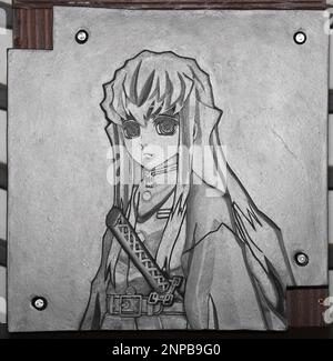 A character of the Demon Slayer, Kimetsu no Yaiba, is carved on ...