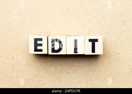 Alphabet letter in word edit on wood background Stock Photo - Alamy
