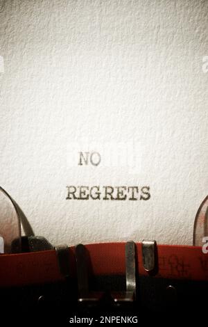 No regrets text written with a typewriter Stock Photo - Alamy
