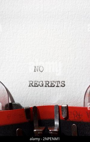 No regrets text written with a typewriter Stock Photo - Alamy