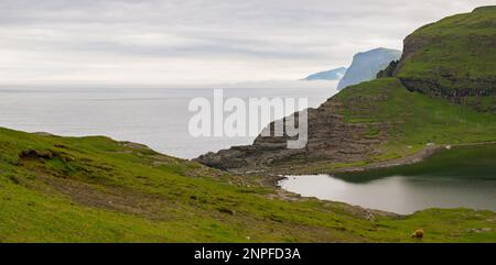 Amazing, panoramic view for Sorvagsvatn (Sørvágsvatn) lake above the ocean level and Traelanipa ...