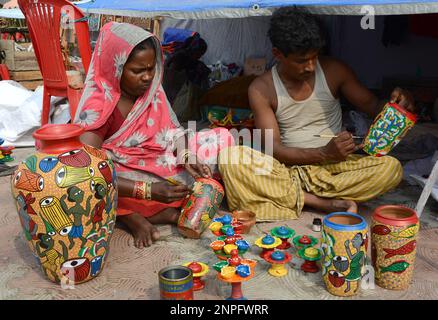 The Bengali rural artists were making hand painting on the selling ...