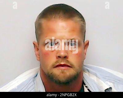 FILE - This undated booking photo provided by the Maricopa County, Ariz., Sheriff's Office shows ...