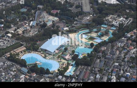 An aerial photo shows facilities such as a swimming pool, merry-go ...