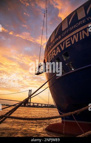 Welders work on the hull of MV BRAVEWIND, the second 10,000 DWT full ...