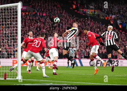 Newcastle United's Dan Burn (centre) celebrates scoring their side's ...