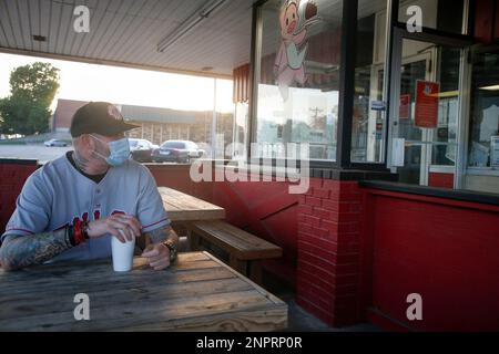 Danny Boy O'Connor sits at Knotty Pig BBQ, Burger & Chili House, which ...