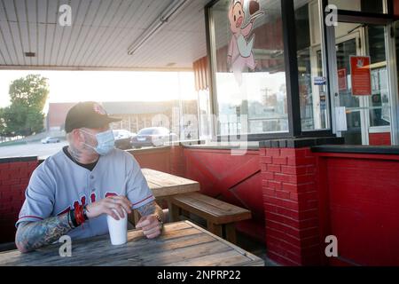 Danny Boy O'Connor sits at Knotty Pig BBQ, Burger & Chili House, which ...