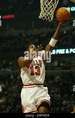 Chicago Bulls guard Kendall Gill (13) makes a move with the basketball ...