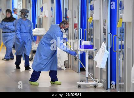 Clinical staff clean Personal Protective Equipment (PPE) at the Royal ...