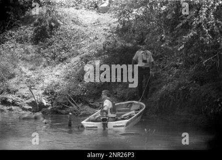 Investigators pull the body of missing person and victim Nathaniel ...