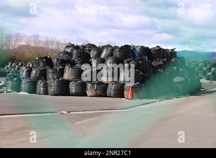 Flexible container bags containing decontaminated soil are stored at an ...