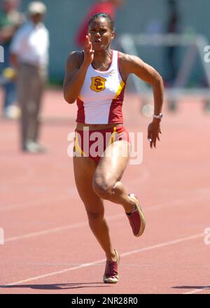 Virginia Powell aka Ginnie Powell of USC celebrates after setting a ...