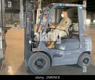 Soldiers with the 1-221 Cavalry process shipments of medical supplies ...