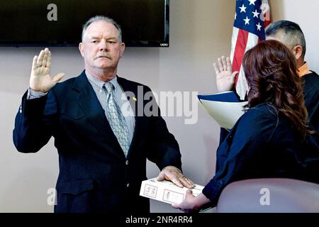 James Lujan is sworn in by the Rio Arriba County Commissioners as the ...