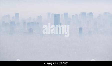 An aerial photo shows foggy landscape in Osaka on February 15, 2020 ...