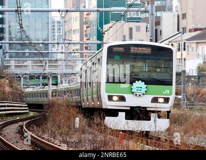 Yamanote Line train runs in Tokyo on Jan. 16, 2020. E231 series of ...