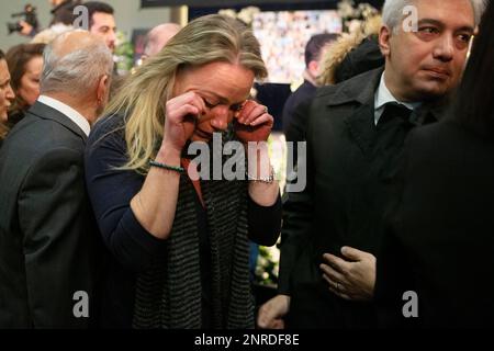 Celeste Poltak wipes away tears following a memorial organized by the ...