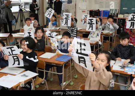Students show calligraphy reading " Shogatu,'' ( New Year) to their ...