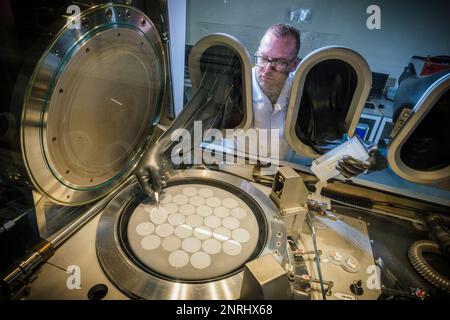 Wafer chips being loaded into a metal organic chemical vapour ...