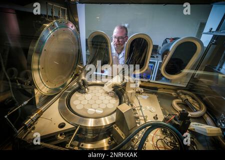 Wafer chips being loaded into a metal organic chemical vapour ...
