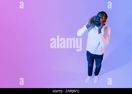 Black African man screaming with joy, overjoyed excited person Stock ...
