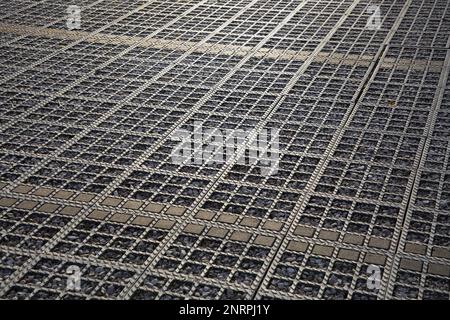Permeable car park surface containing Gravel pebbles to allow standing ...