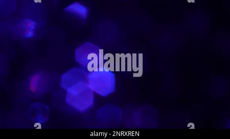 Abstract 4K blue glowing glitter particles 4K animation New Motion Background. Light flash For ...