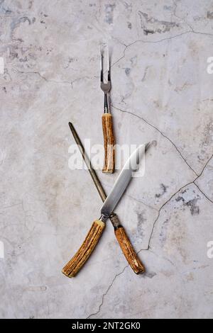 Top view at knife, fork and sharpener Stock Photo - Alamy