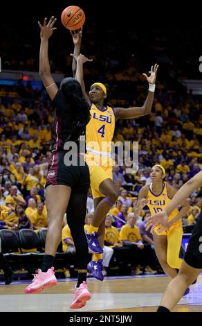 LSU guard Flau'jae Johnson (4) shoots against Hawaii guard Meilani ...