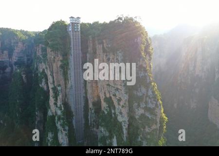 Aerial view of the Bailong Elevator built on a cliff in Zhangjiajie in ...
