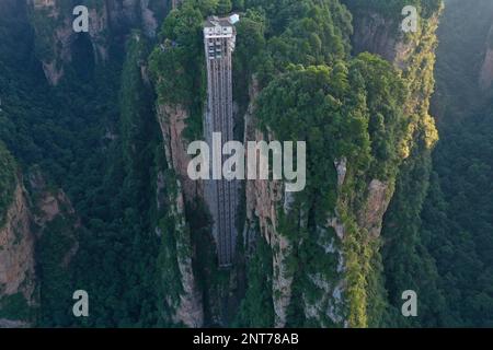 Aerial view of the Bailong Elevator built on a cliff in Zhangjiajie in ...