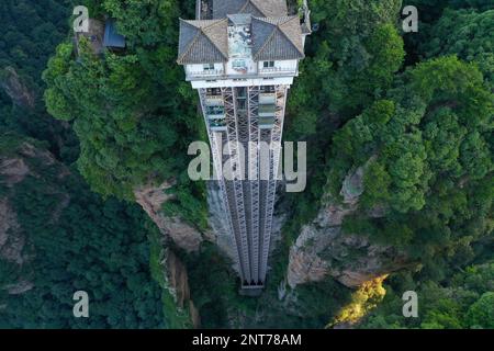 Aerial view of the Bailong Elevator built on a cliff in Zhangjiajie in ...