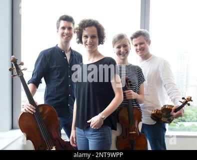 (L to R) Sindri Lederee, a violinist, Antonia Koster, a pianist, Andrea ...