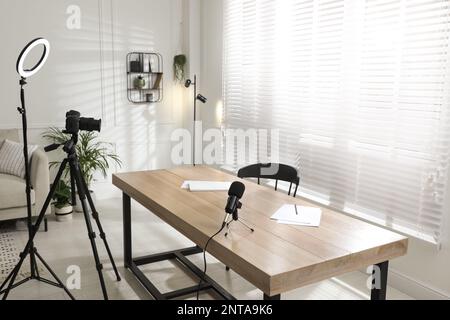Ring light, camera and microphone for blogging in room Stock Photo - Alamy