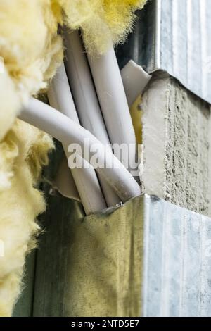 Incorrect cable routing in the stud frame Stock Photo - Alamy