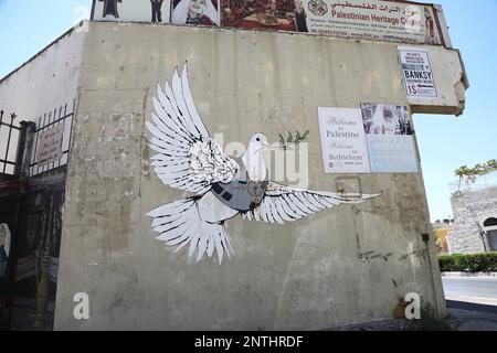 A photo shows "Armored Dove" by an elusive artist Banksy in Bethlehem ...