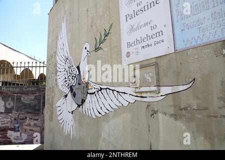 A photo shows "Armored Dove" by an elusive artist Banksy in Bethlehem ...
