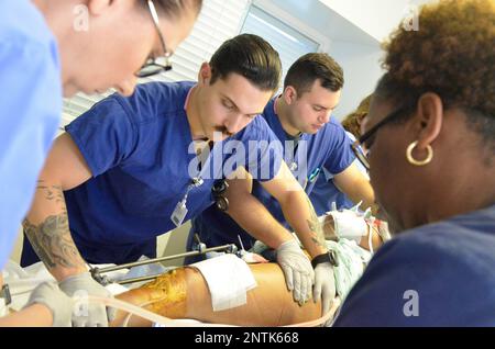 US Navy U.S. Navy Hospital Corpsmen, assigned to Navy Environmental and ...