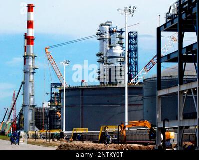 Huge oil tanks are pictured on the premises of the Shell refinery in ...