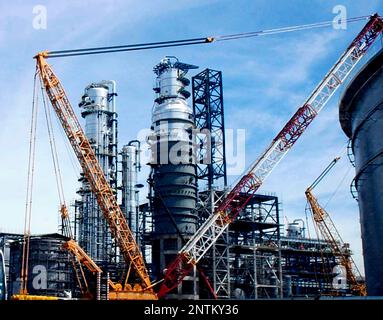 Huge oil tanks are pictured on the premises of the Shell refinery in ...