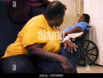 The body of one of nine victims is taken out of the RCBC Bank following ...